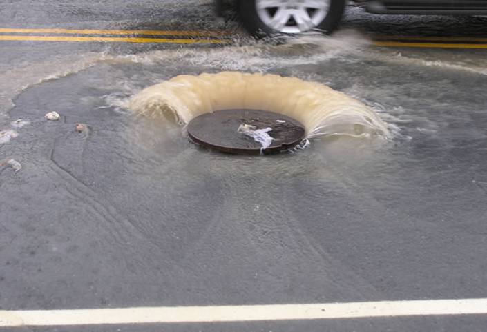 Stormwater manhole overflow (credit Chris Zurcher) - Save the Sound
